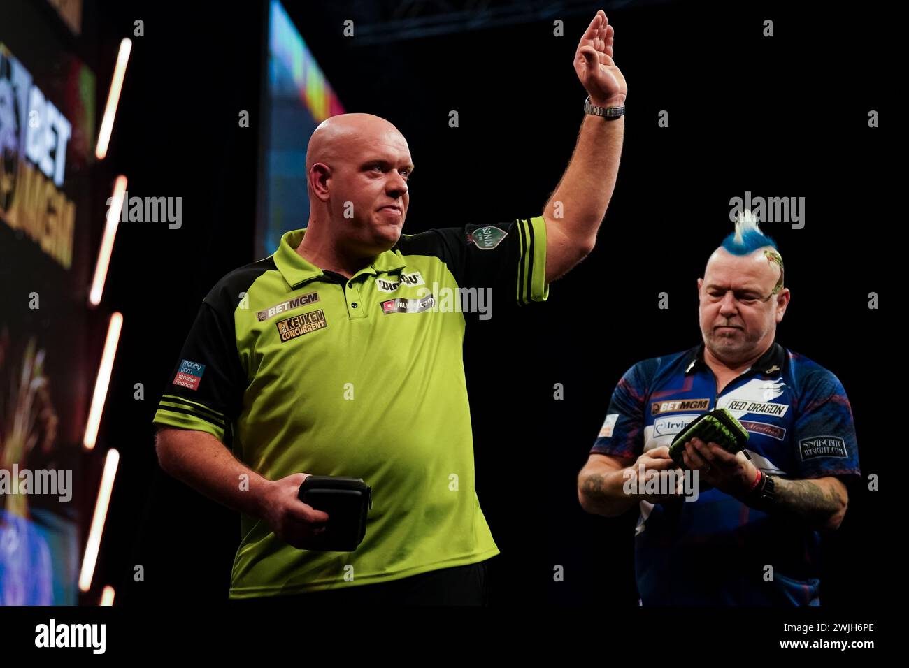 Michael van Gerwen reacts after beating Peter Wright during night three ...