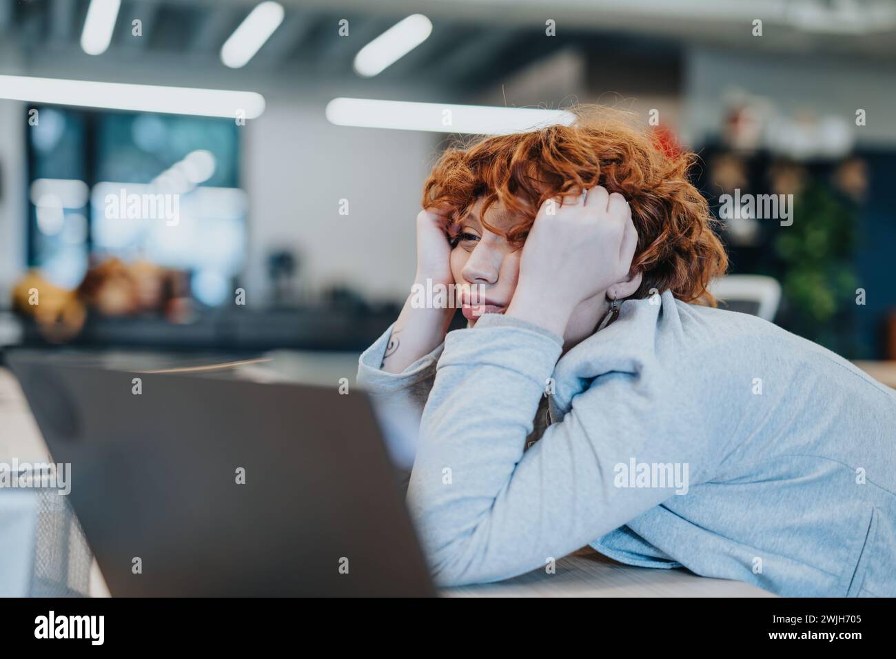 After a challenging day at the office, the lovely redhead employee ...