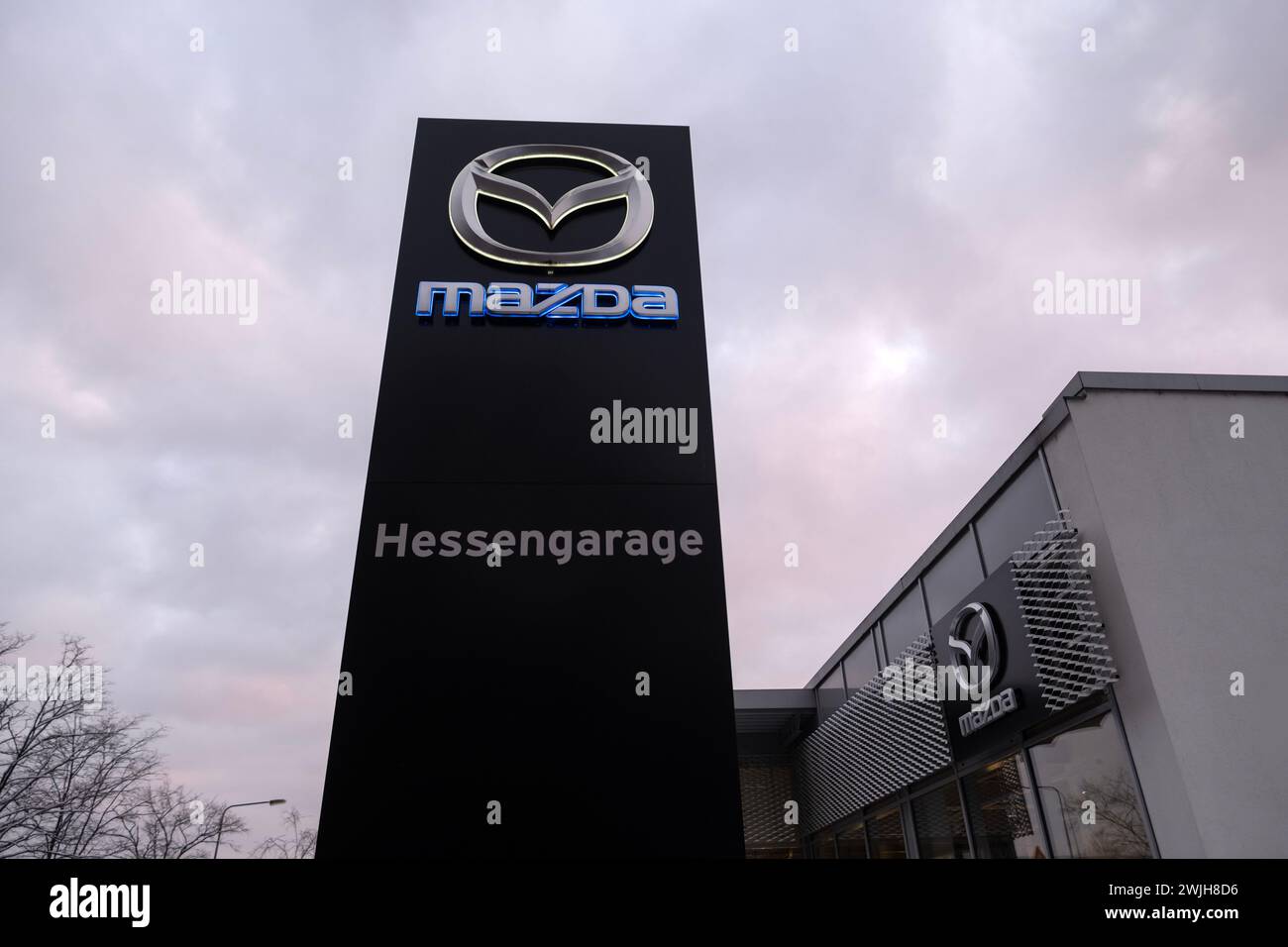 Advertising banners Mazda, car dealership building, Japanese automobile ...