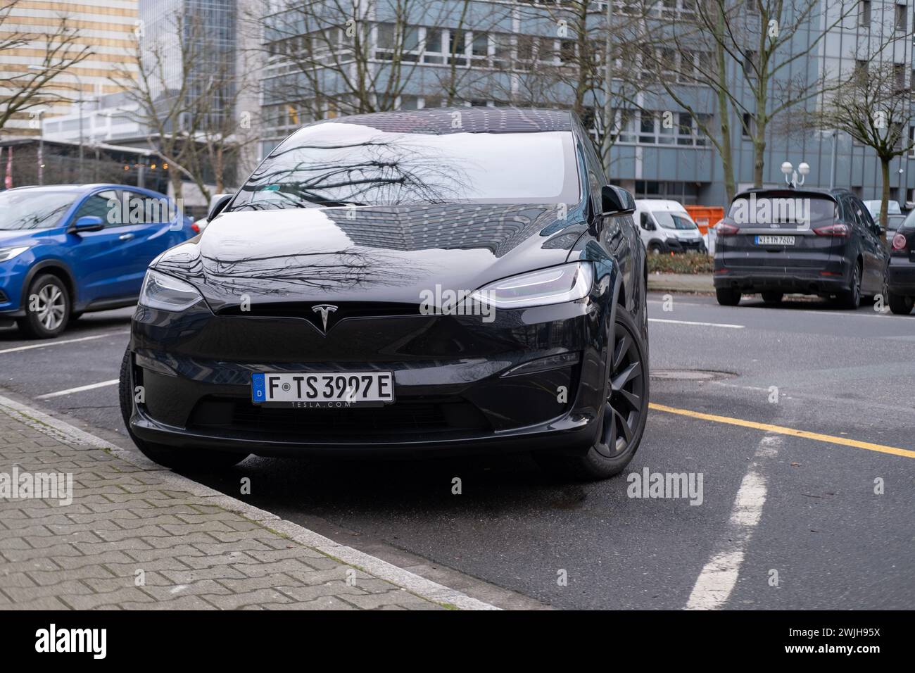black electric car tesla, Model X parked on street, popular Elektro-SUV ...