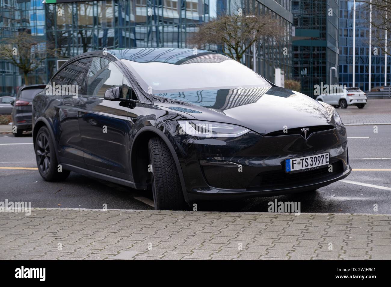 black electric car tesla, Model X parked on street, popular Elektro-SUV ...