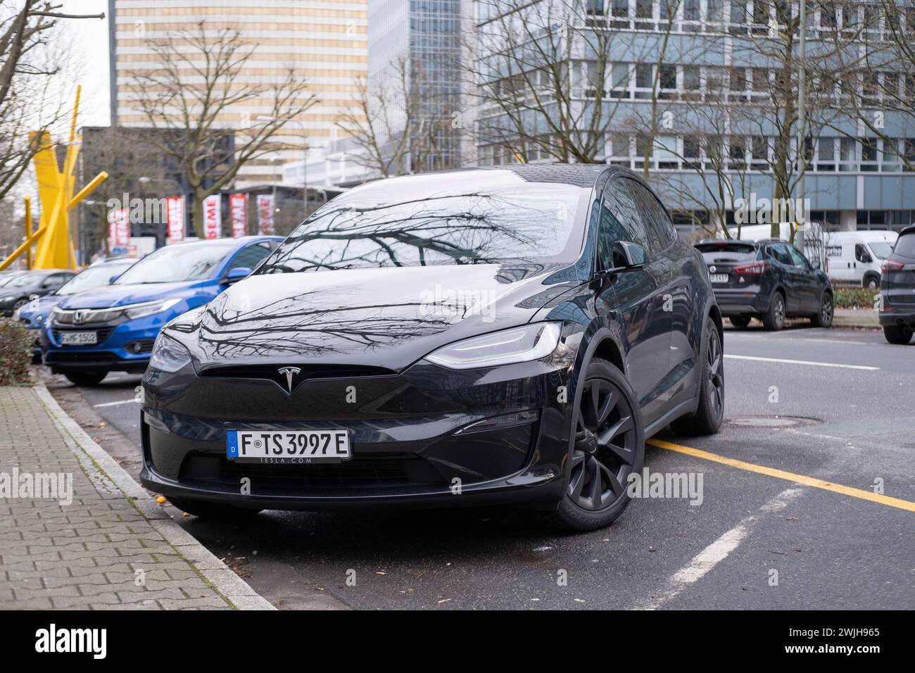 black electric car tesla, Model X parked on street, popular Elektro-SUV ...