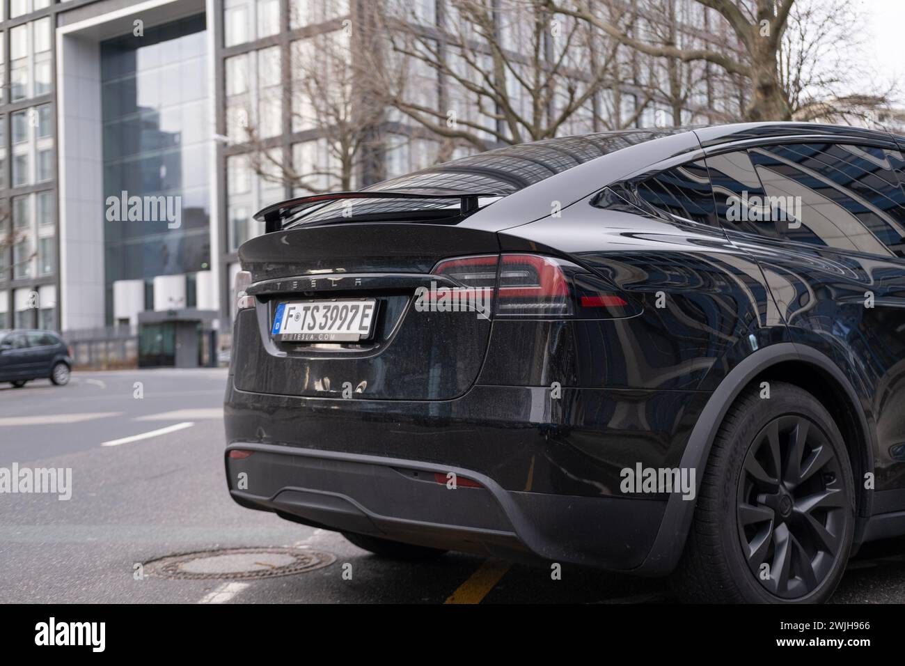 black electric car tesla, Model X parked on street, popular Elektro-SUV ...