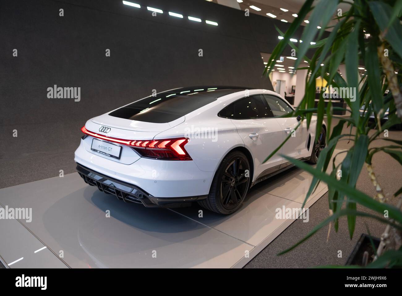 white new Luxury Electric Car Audi e-tron GT, taillights, limousine ...