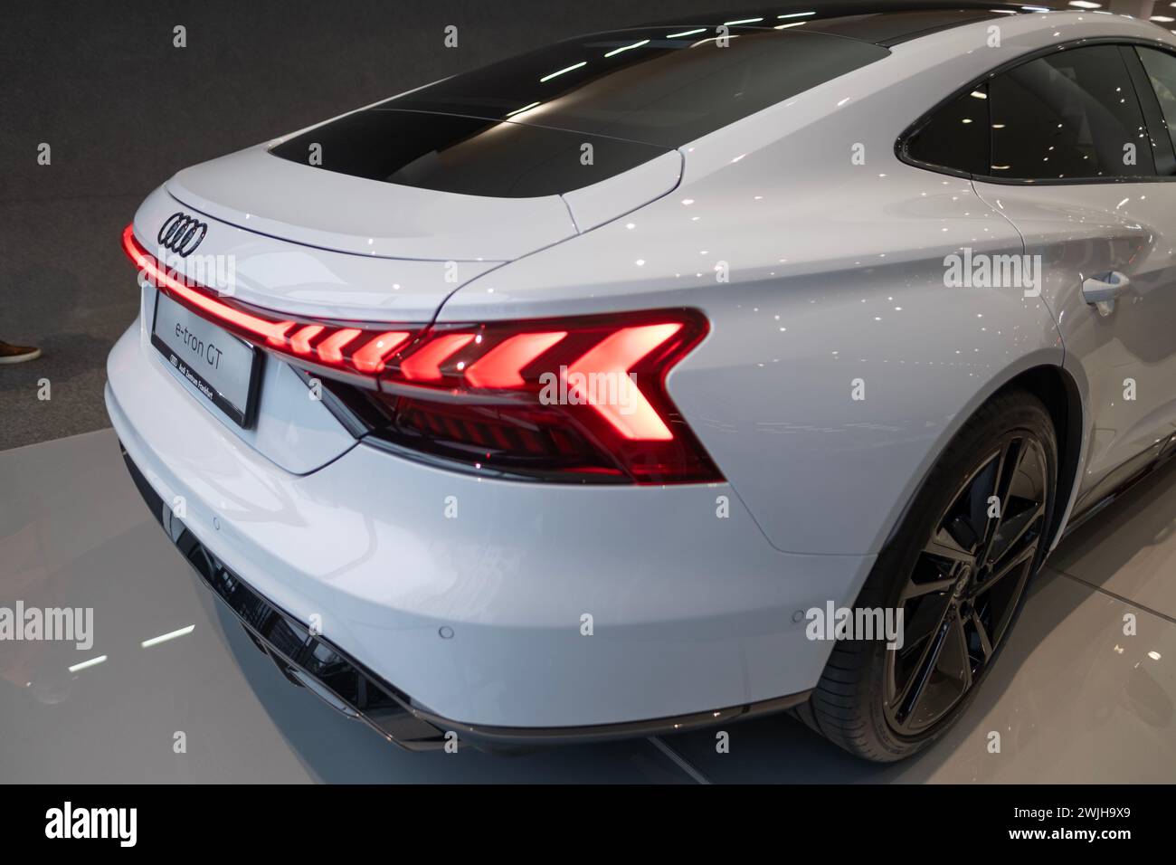 white new Luxury Electric Car Audi e-tron GT, taillights, limousine ...