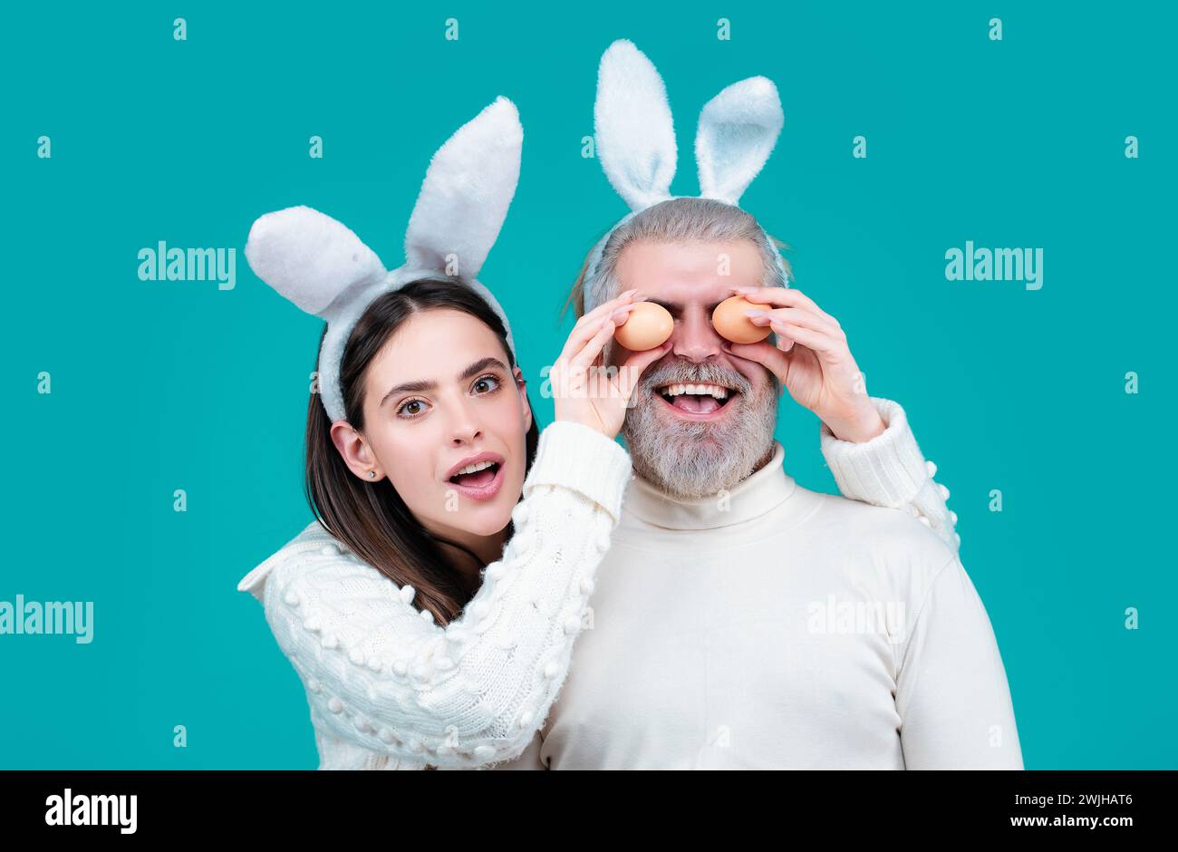 Easter couple. Smiling happy spring couple looking camera Stock Photo ...