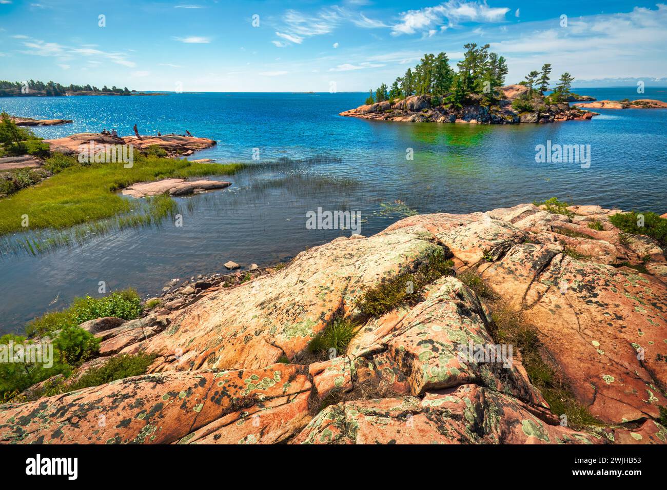 Beautiful Georgian Bay with red granite rock shoreline and islands, in ...