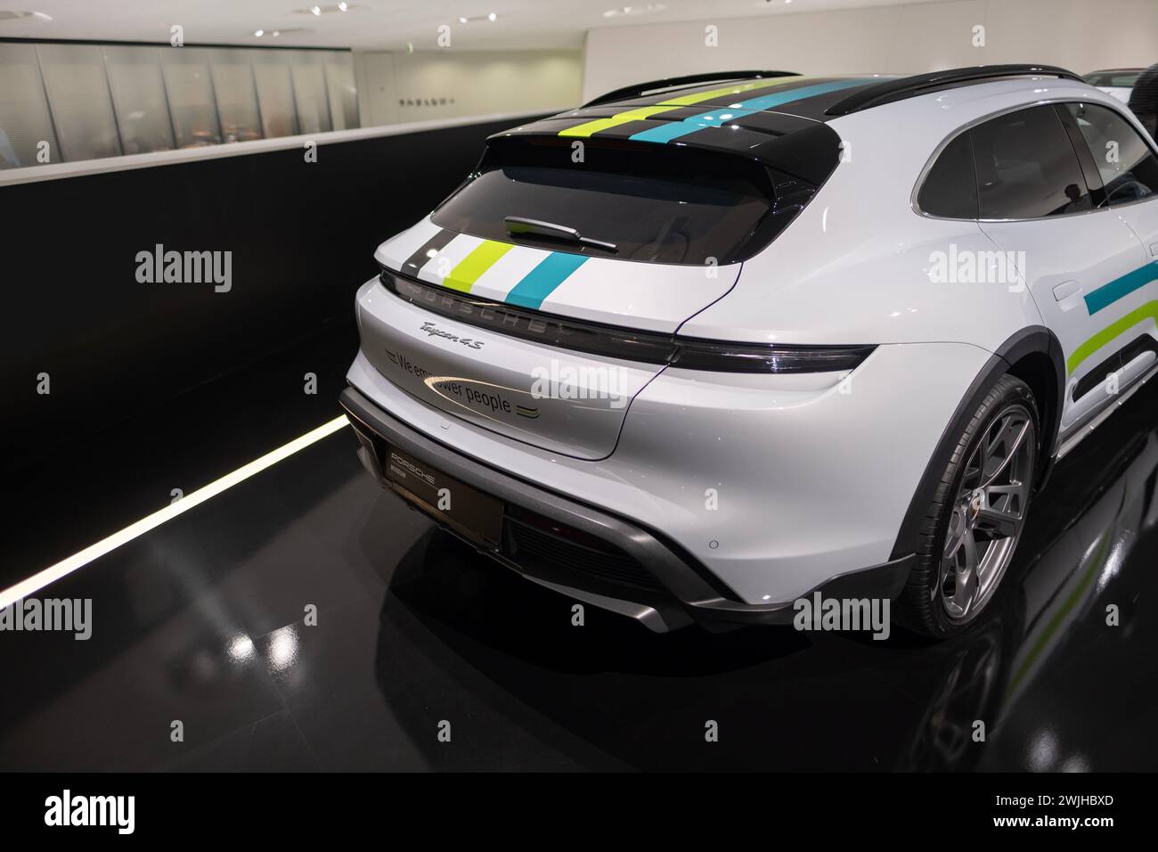 white Porsche Taycan 4S Cross Turismo EV rear view, battery-electric ...