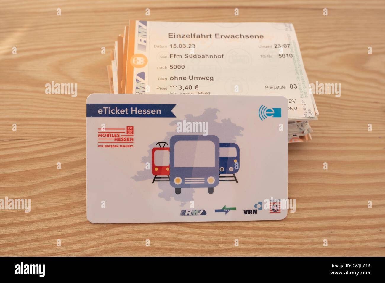 closeup electronic eTicket on table, monthly train, bus travel passes ...