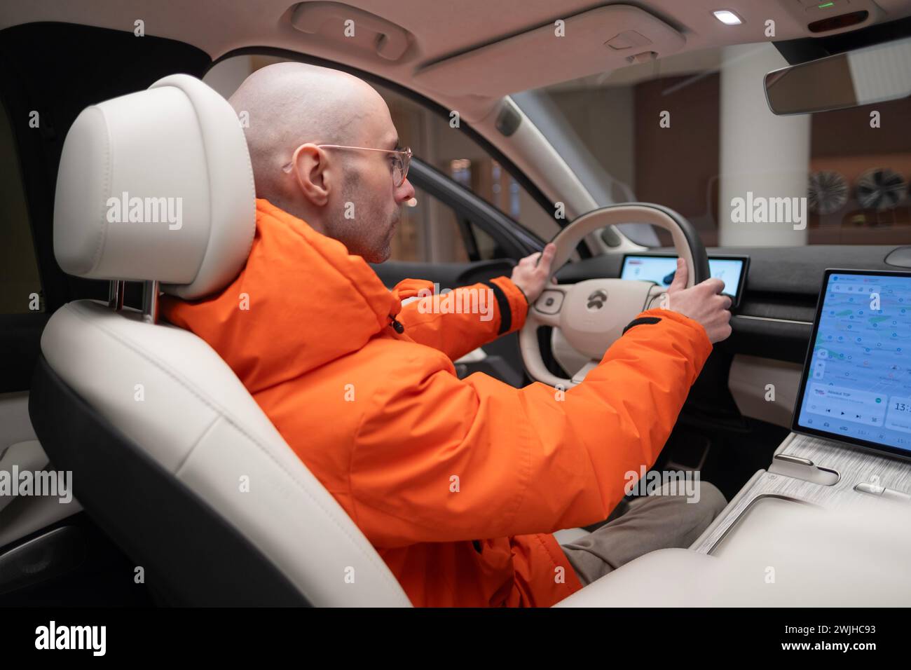 man in car driving NIO EL7, digital panel, Interior, cockpit modern EV ...