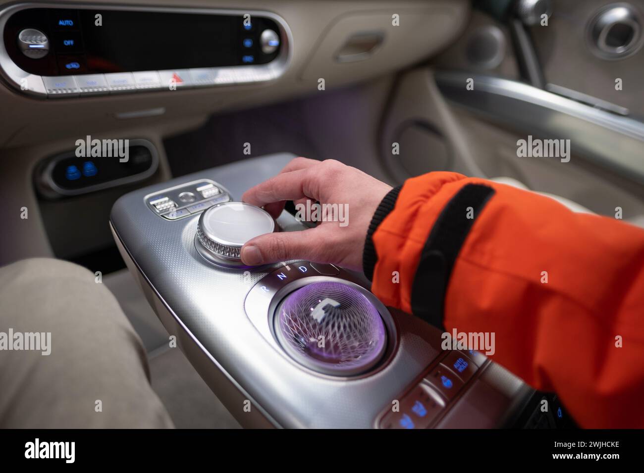 Interior, cockpit of Genesis GV60 Electric Car, driver adjusting ...