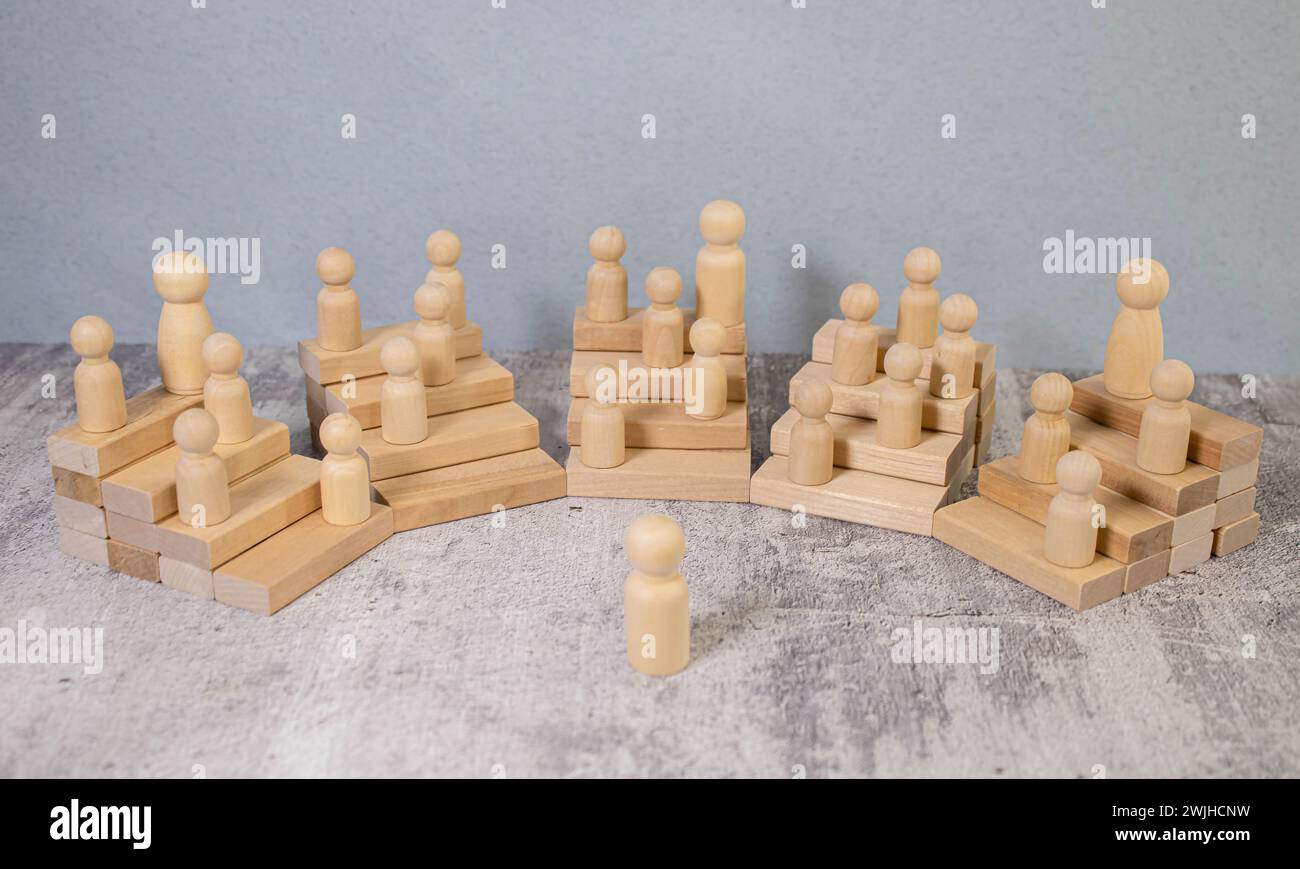 Wooden figures of people. Career and personal growth, business ...
