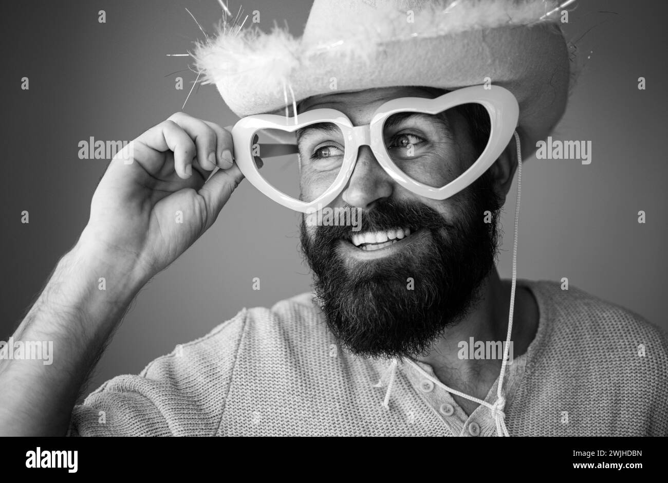 Hipster with beard and mustache in funny big eyeglasses. Happy man ...