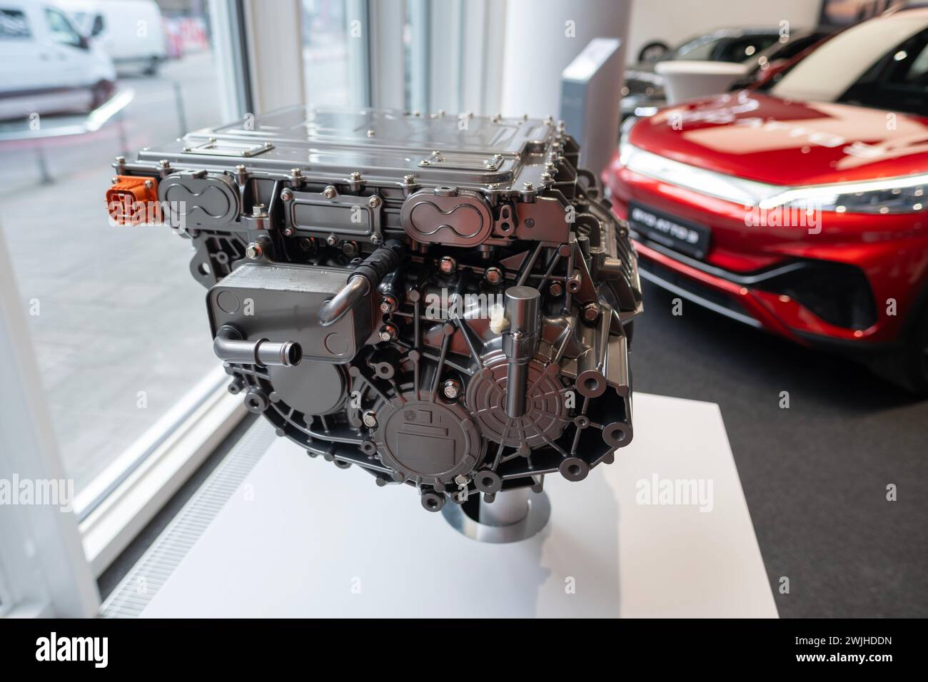 innovative electric motor BYD Electric against background of red BYD ...