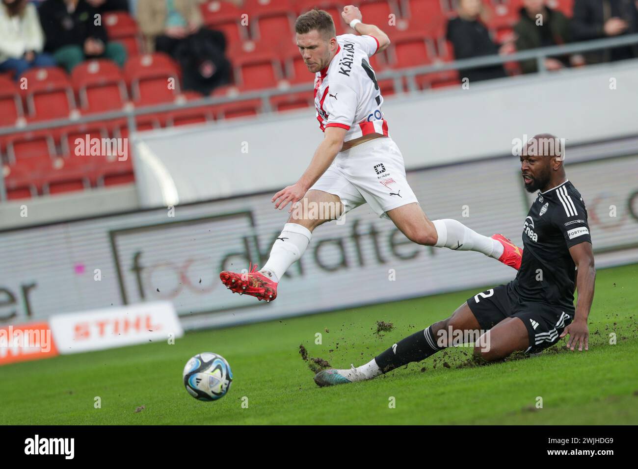 Benjamin Kallman of Cracovia (L) and Mike Cestor of Radomiak (R ) seen ...