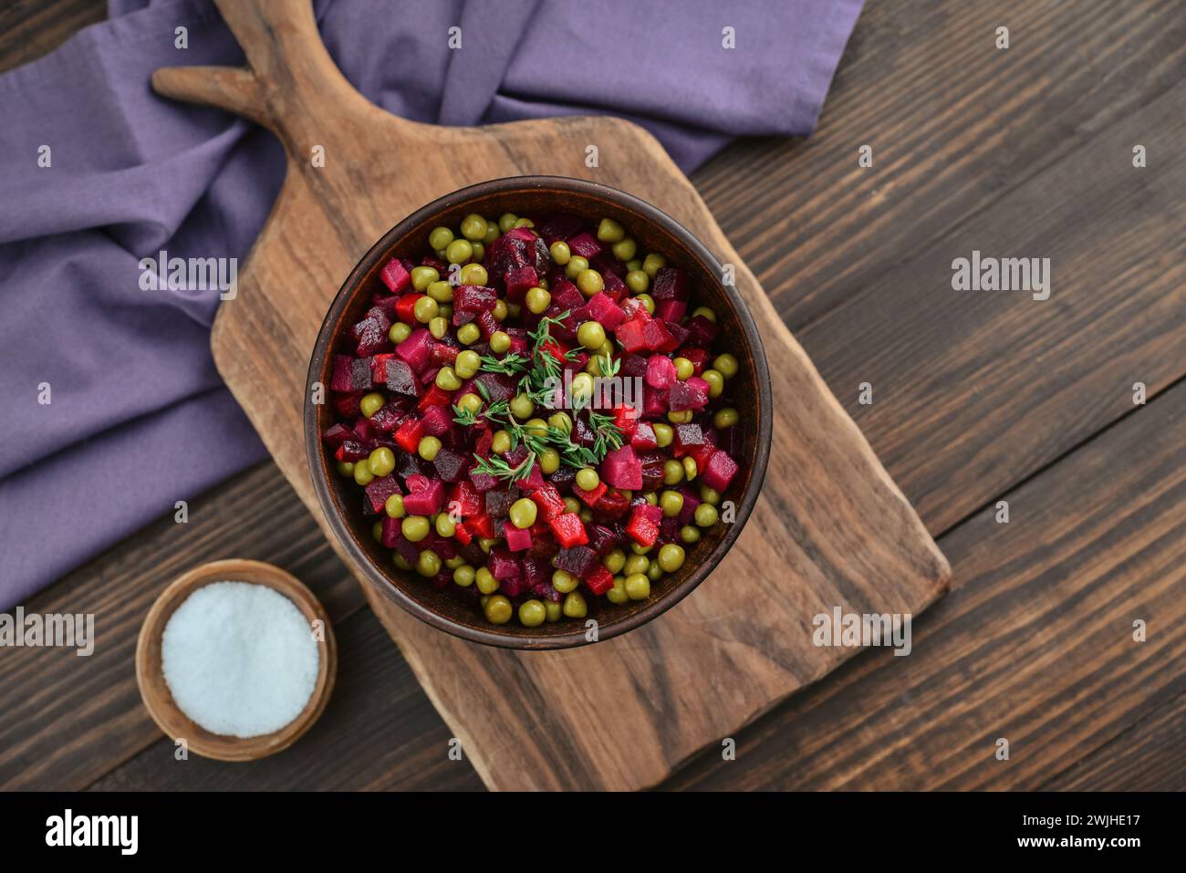 Vinegret - traditional Russian vegetable salad in bowl on wooden ...