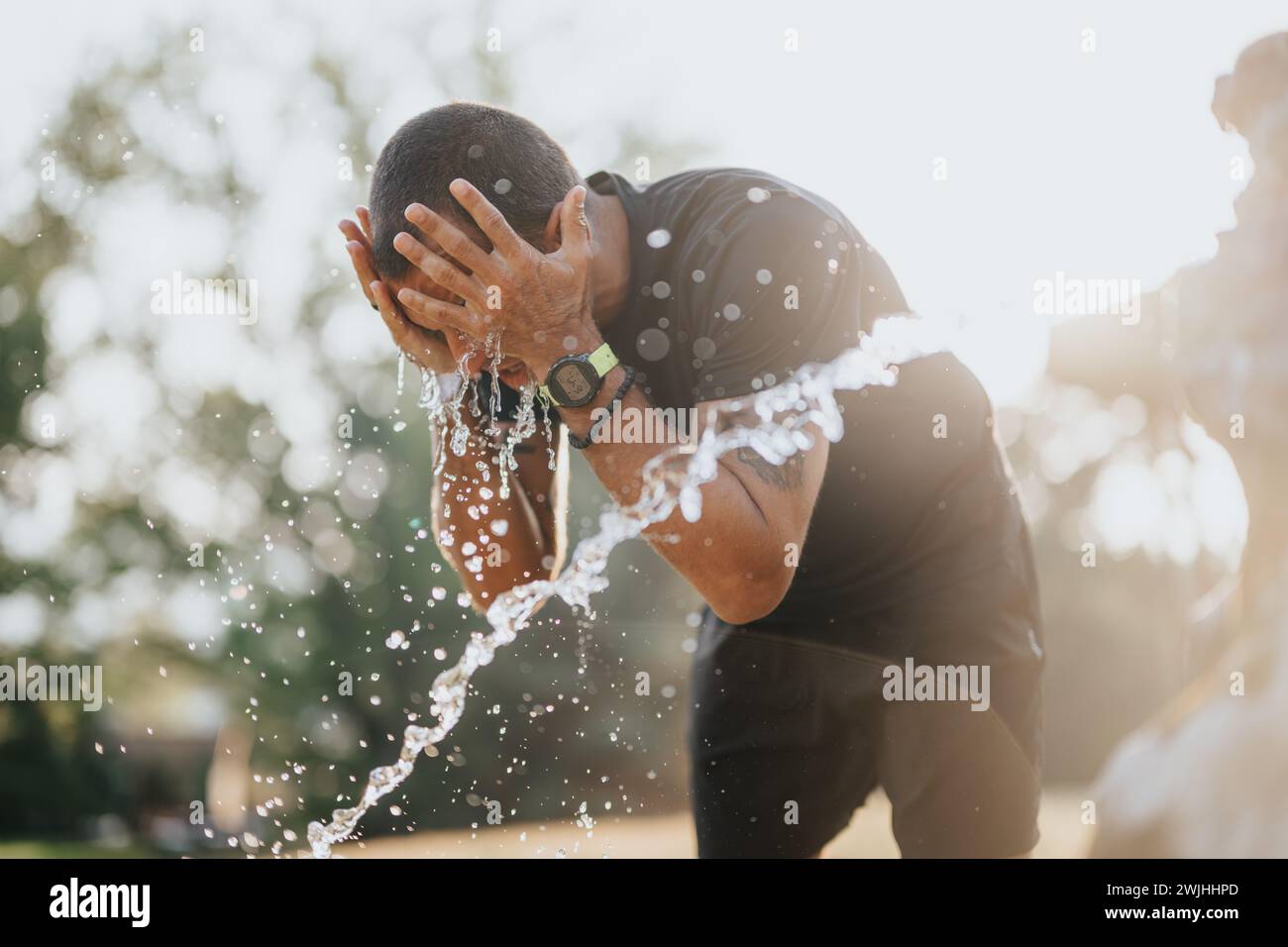 Friends refreshing drinking fountain hi-res stock photography and ...