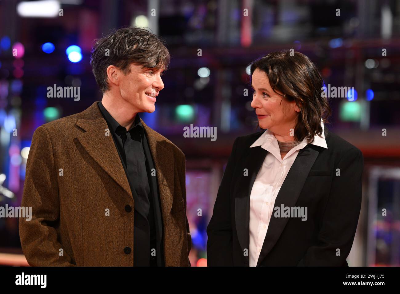 Berlin, Germany. 15th Feb, 2024. Actor Cillian Murphy and actress Emily Watson walk the red ...
