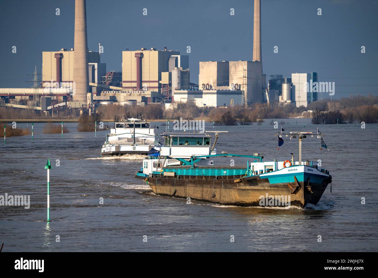 Cargo ships on the Rhine near Rheinberg, in the background the ...