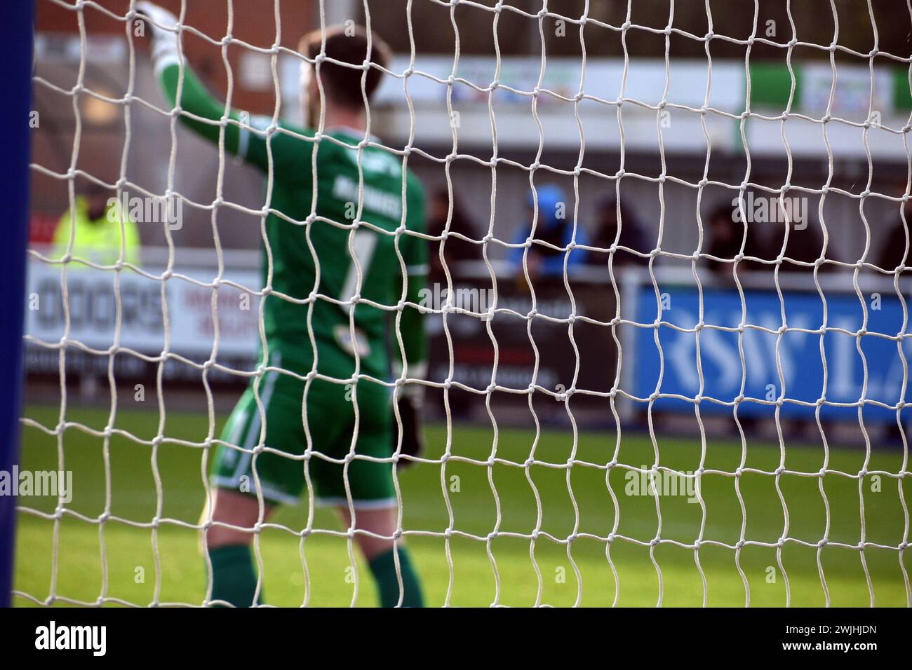 Football Goalie in the green kit Stock Photo - Alamy