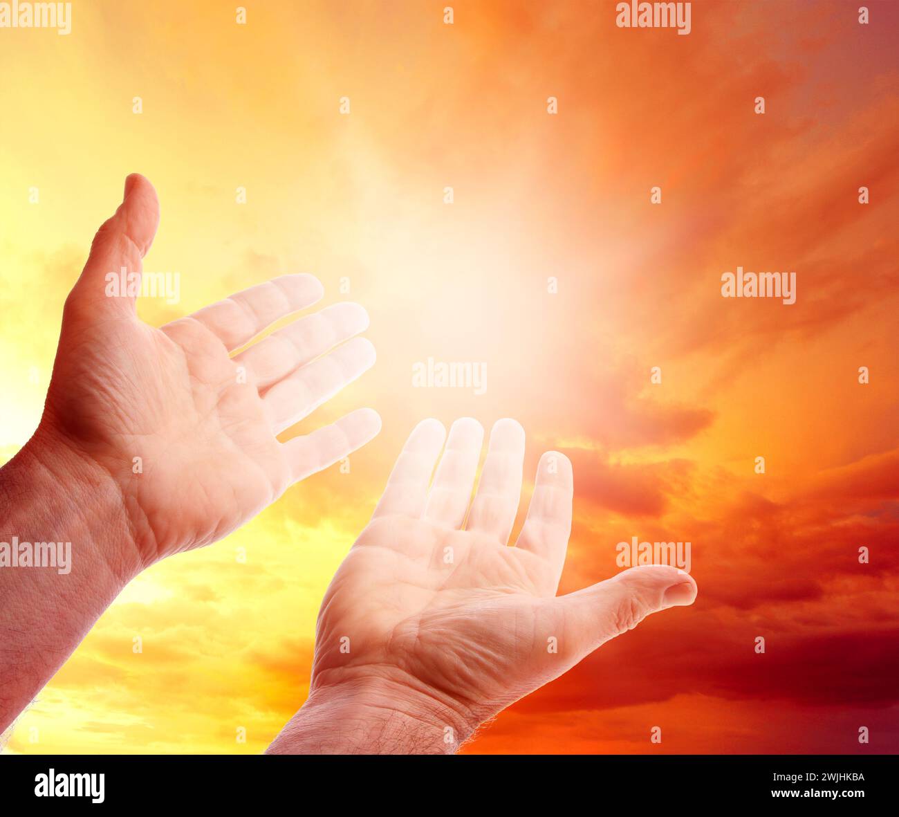 Hands reaching for the sky Stock Photo - Alamy