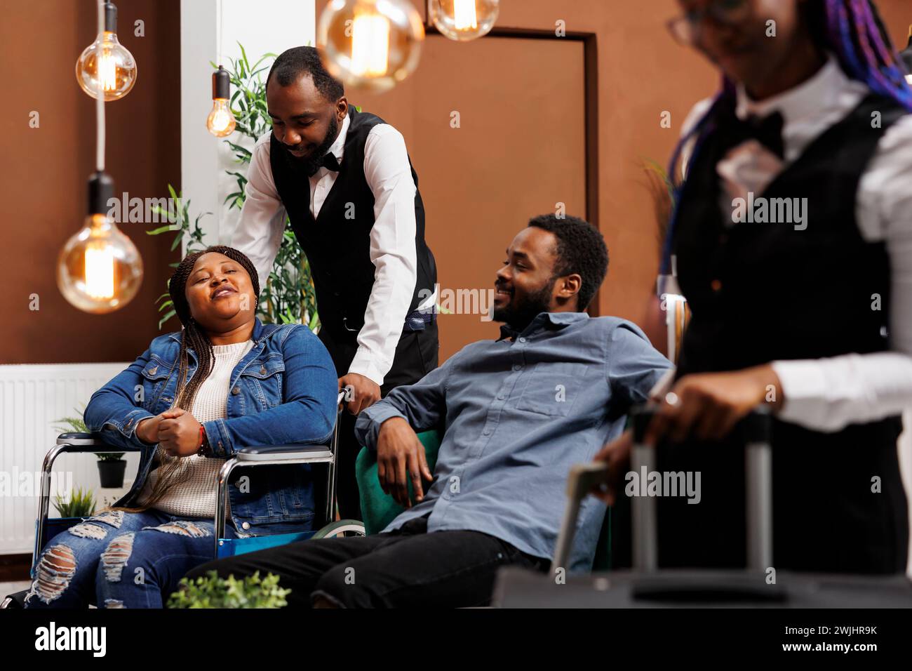 Woman offering help man sitting hi-res stock photography and images - Alamy