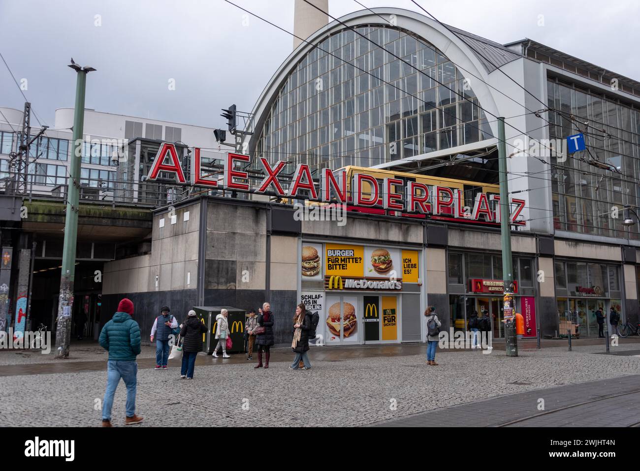 Alexanderplatz with station entrance and McDonald's sign, Berlin ...
