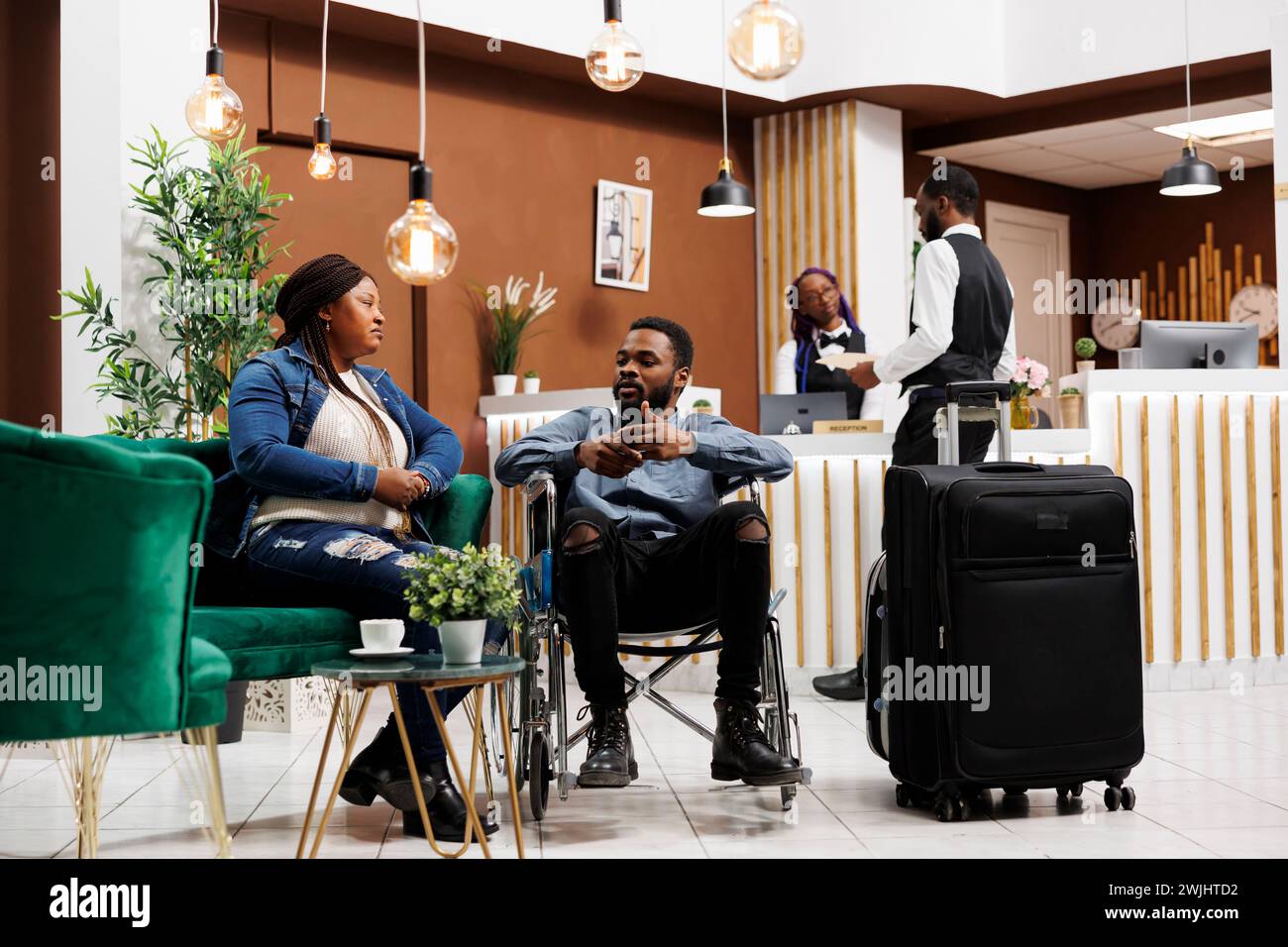 Unhappy customer at hotel front desk hi-res stock photography and ...