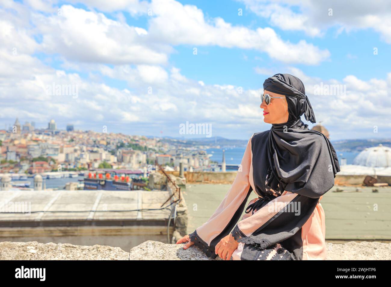 From Suleymaniye Mosque, Islamic woman in traditional Arab hijab dress ...