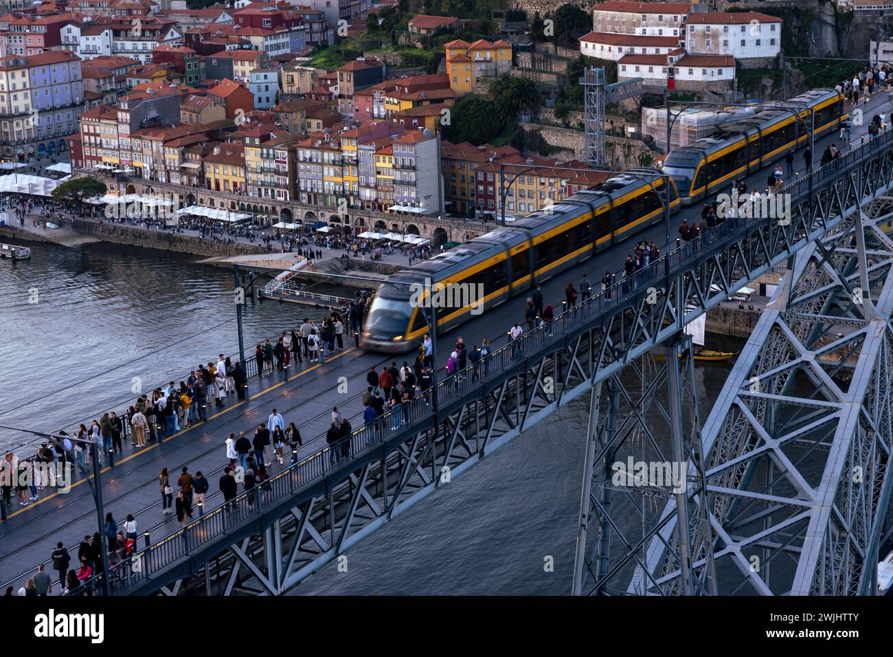 Metro crossing the Dom Luis I bridge in the City of Porto in Portugal ...