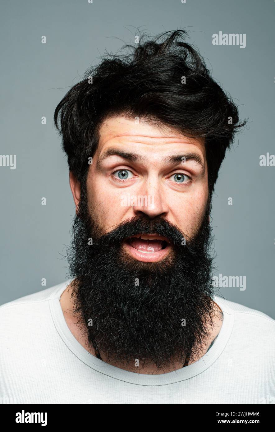 Funny face. Surprised handsome man. Shocked male model with surprise ...
