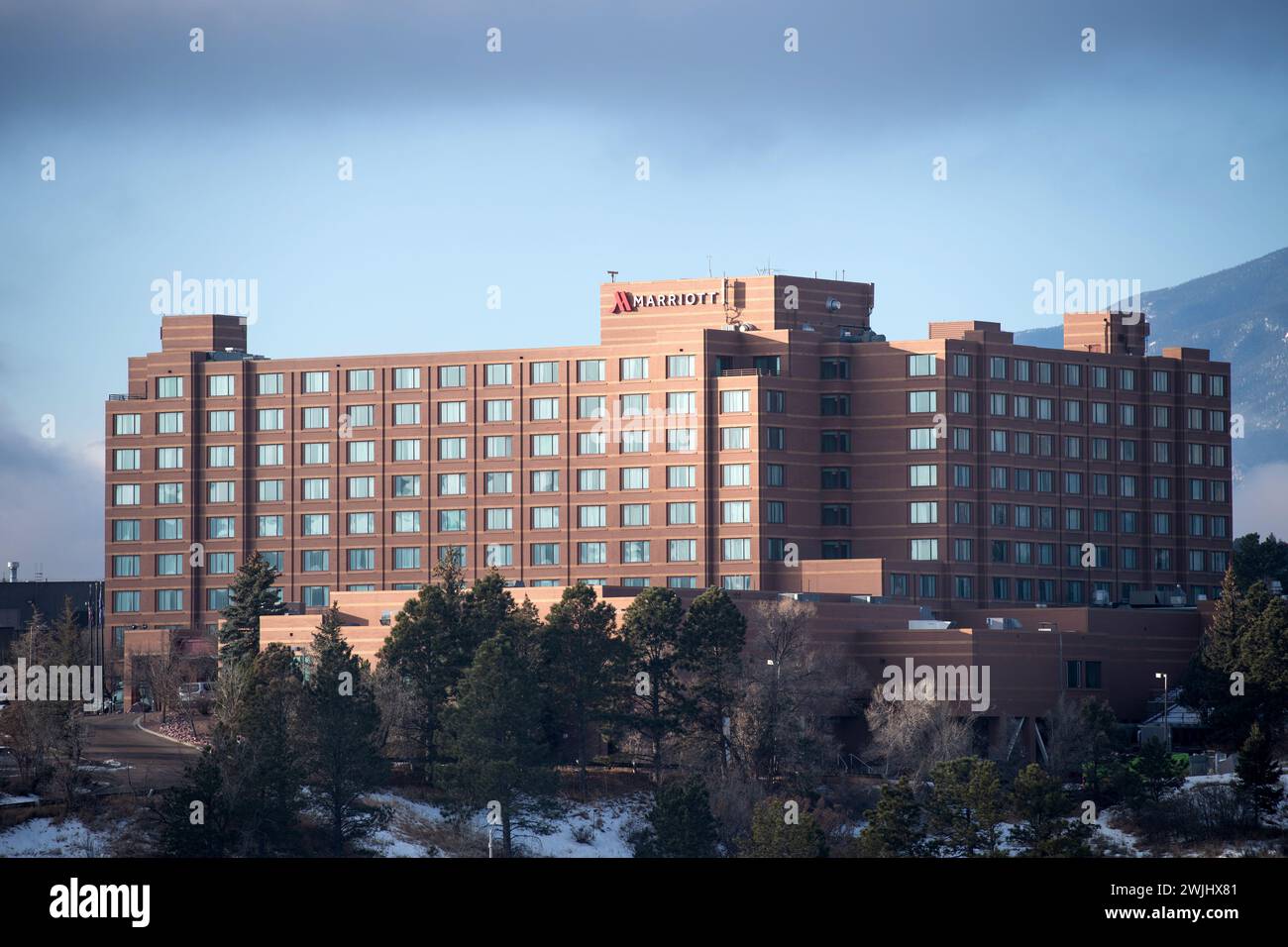 Sunrise on the Marriott Hotel, with the Rocky Mountains in the distance ...