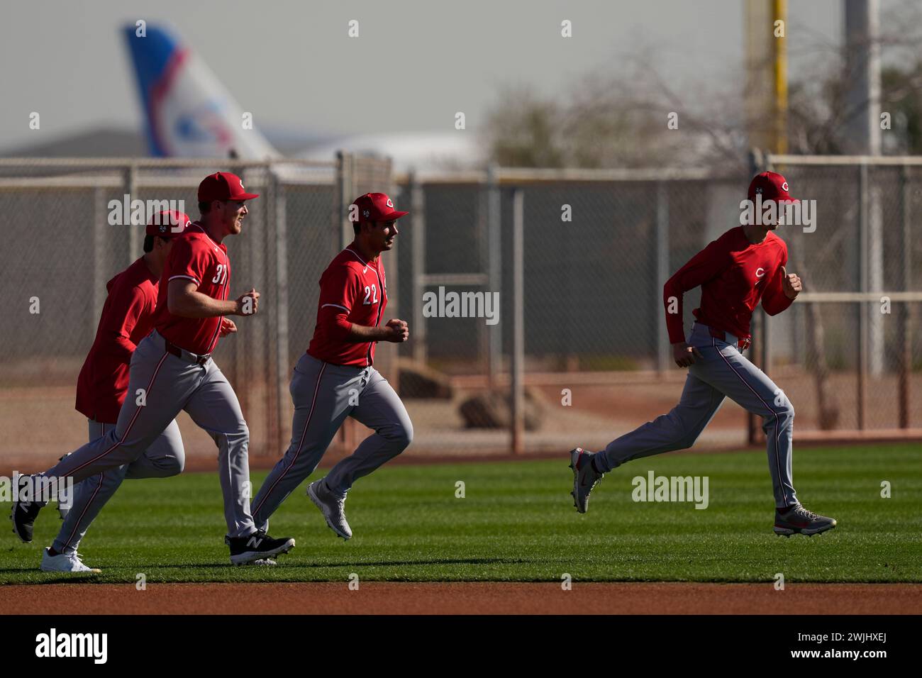 Cincinnati Reds teammates, from second from left, Tyler Stephenson ...