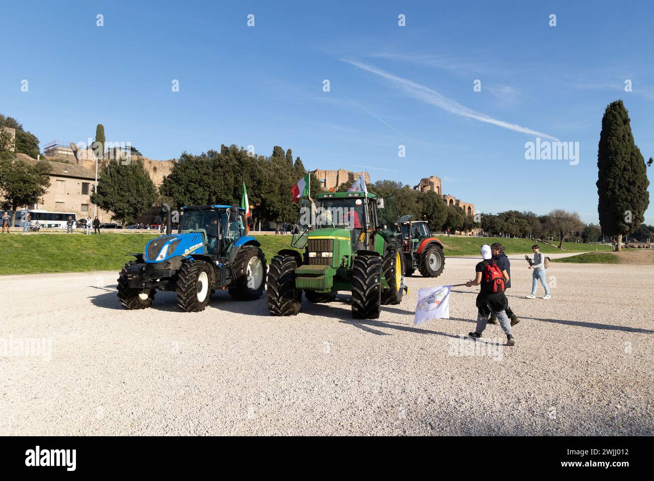 Rome, Italy. 15th Feb, 2024. Tractors enter the Circus Maximus in Rome ...