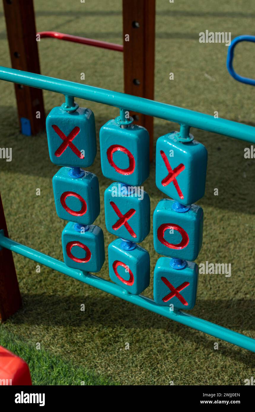 Closeup of a tic tac toe game in a colorful playground Stock Photo - Alamy