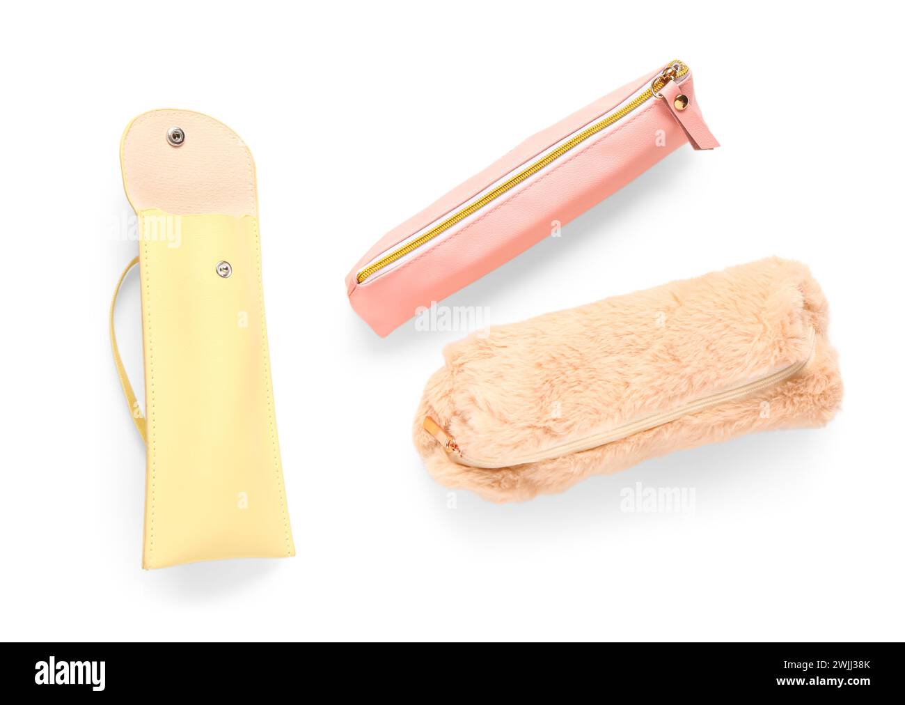Different colorful pencil cases on white background Stock Photo - Alamy