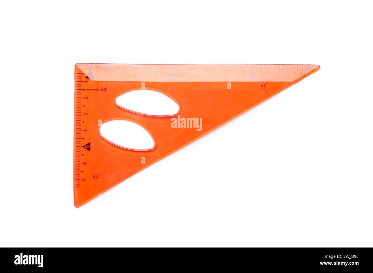 Orange triangle plastic ruler on white background Stock Photo - Alamy