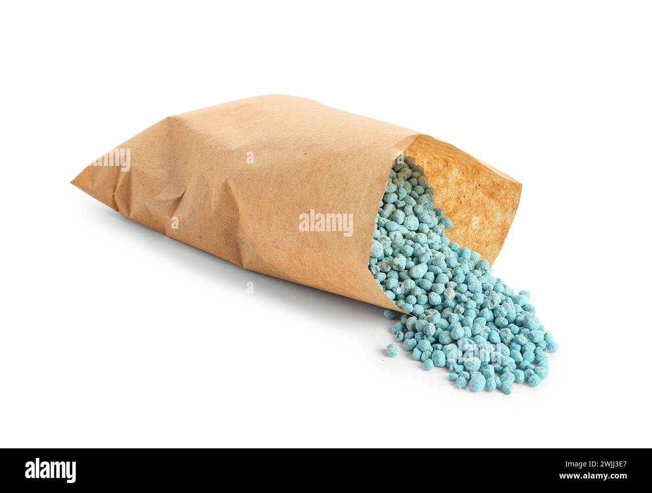 Paper bag with blue granular fertilizer isolated on white background ...