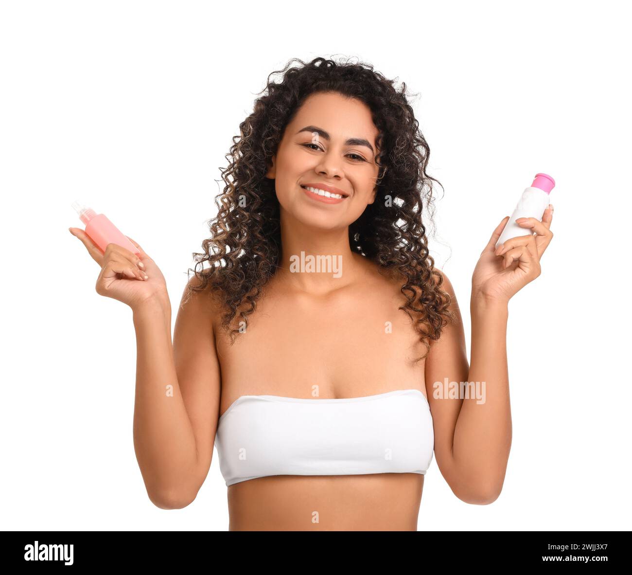 Beautiful African American Woman With Hair Products On White Background