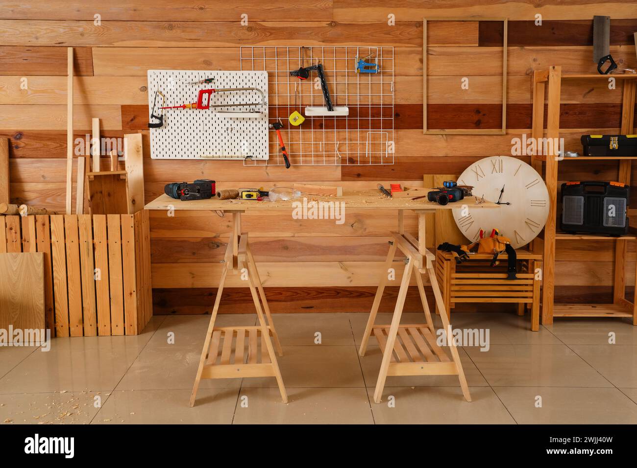 Interior of carpenter's workshop with table and tools Stock Photo - Alamy