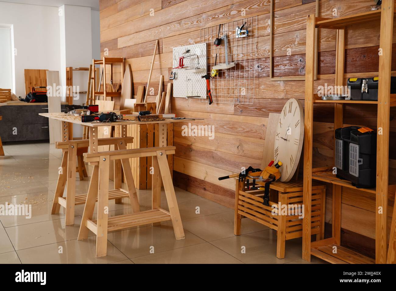 Interior of carpenter's workshop with table and tools Stock Photo - Alamy