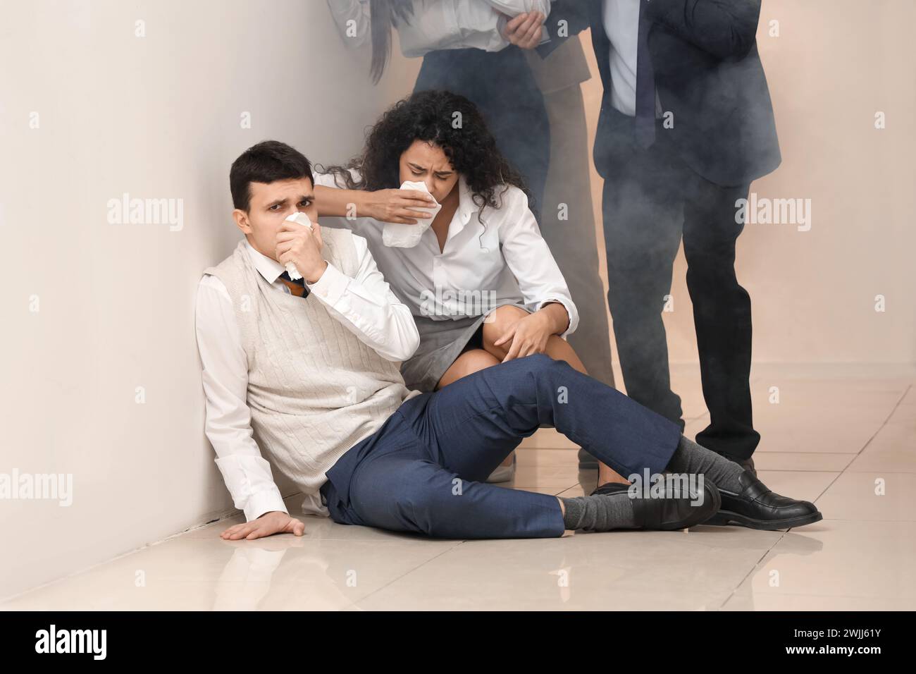 Business people with covered faces choking on smoke in burning office ...