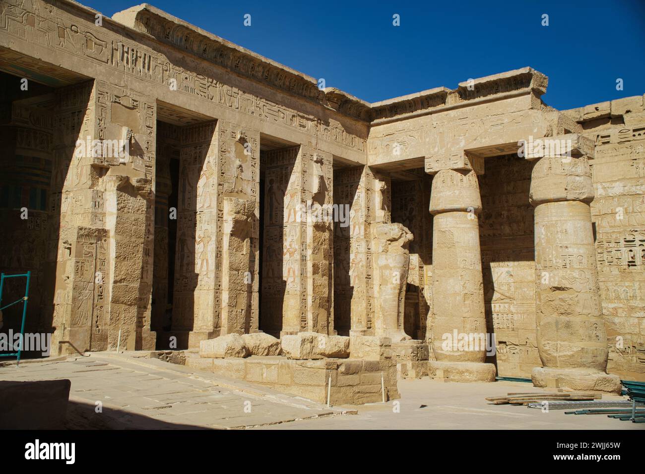 Ancient Egyptian structures, walls, columns, pillar covered colorful ...