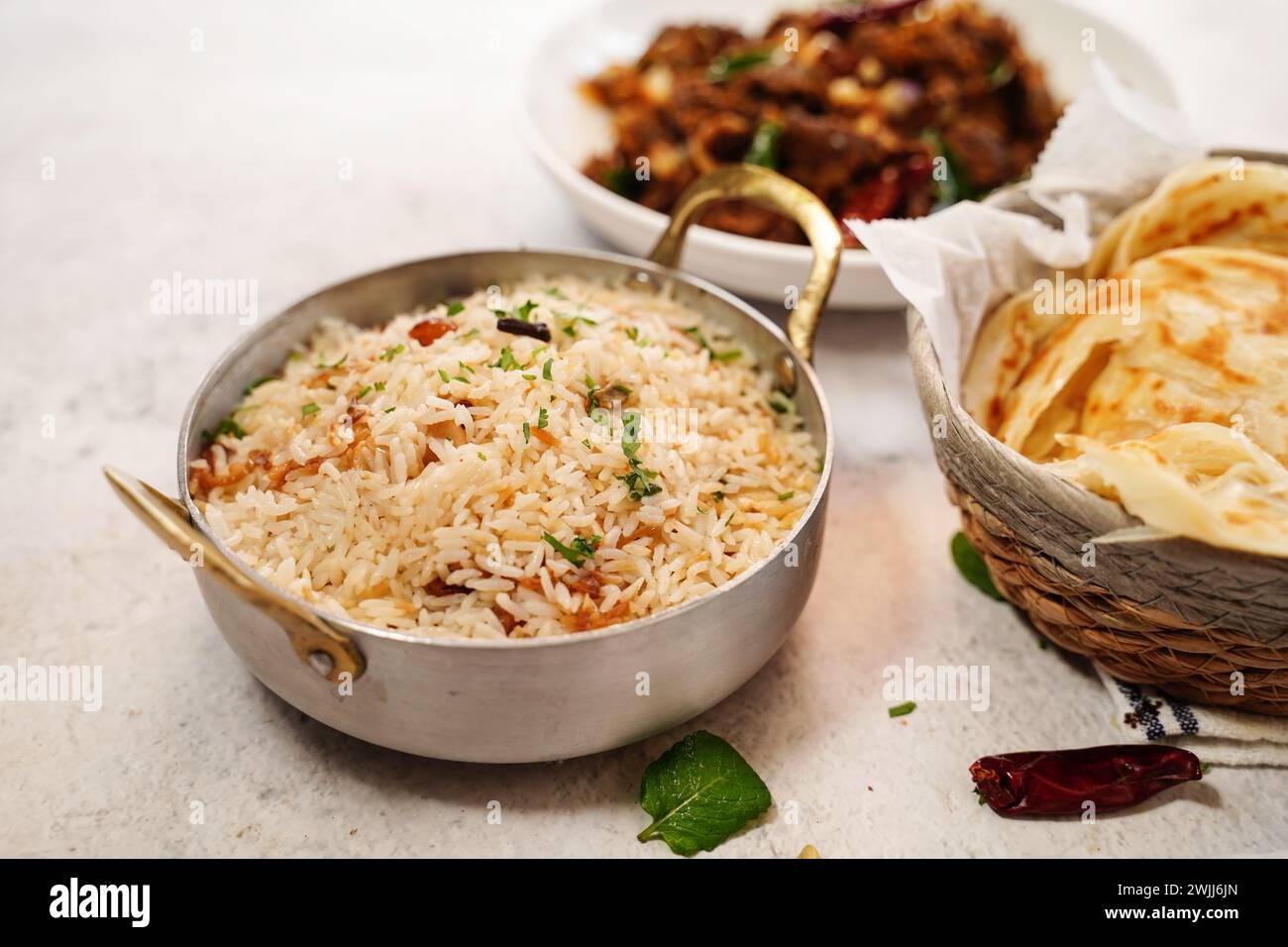Kerala beef fry roast served with parotta and ghee rice - Malabar Iftar ...