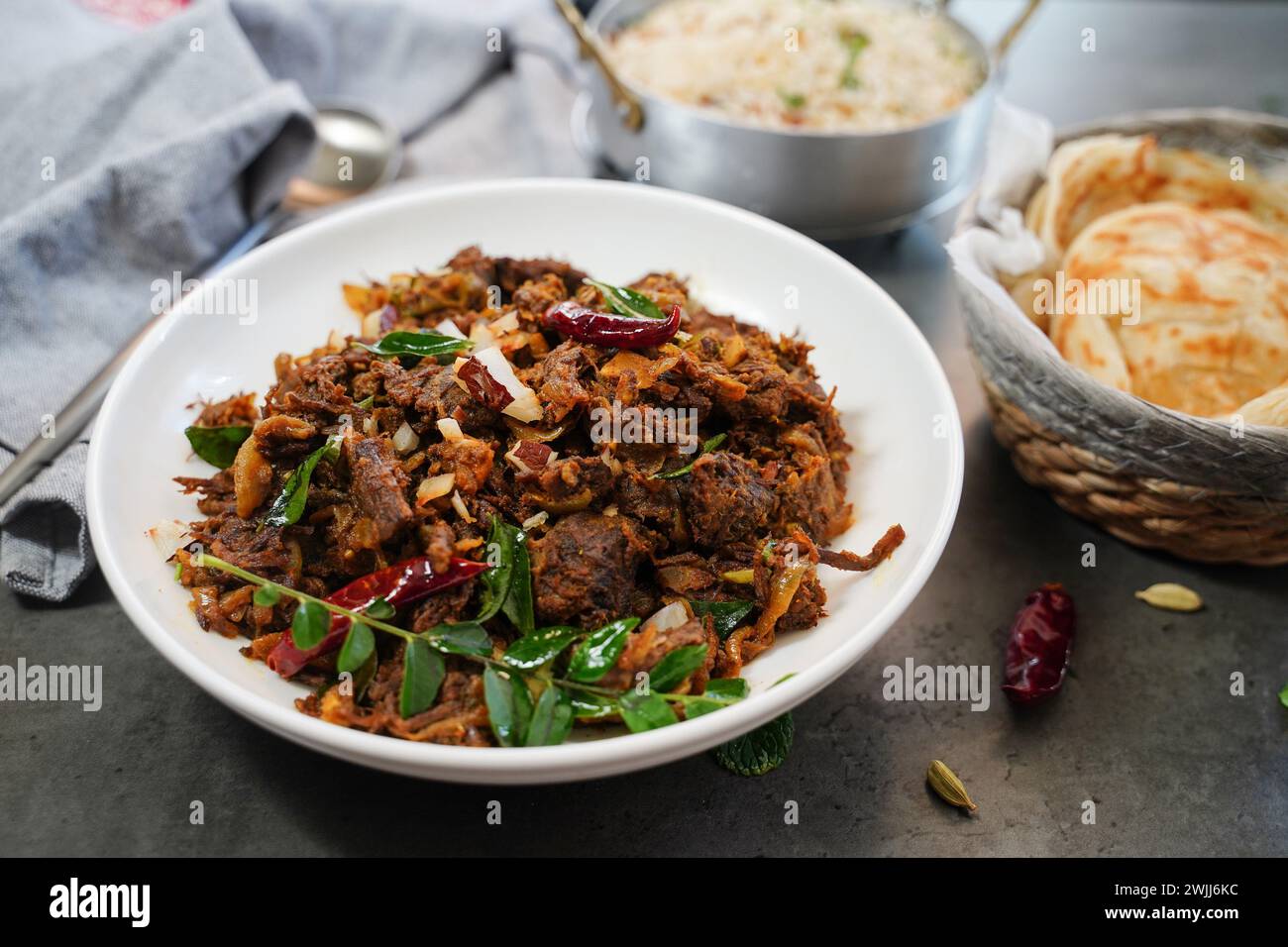 Kerala beef fry roast served with parotta and ghee rice - Malabar Iftar ...