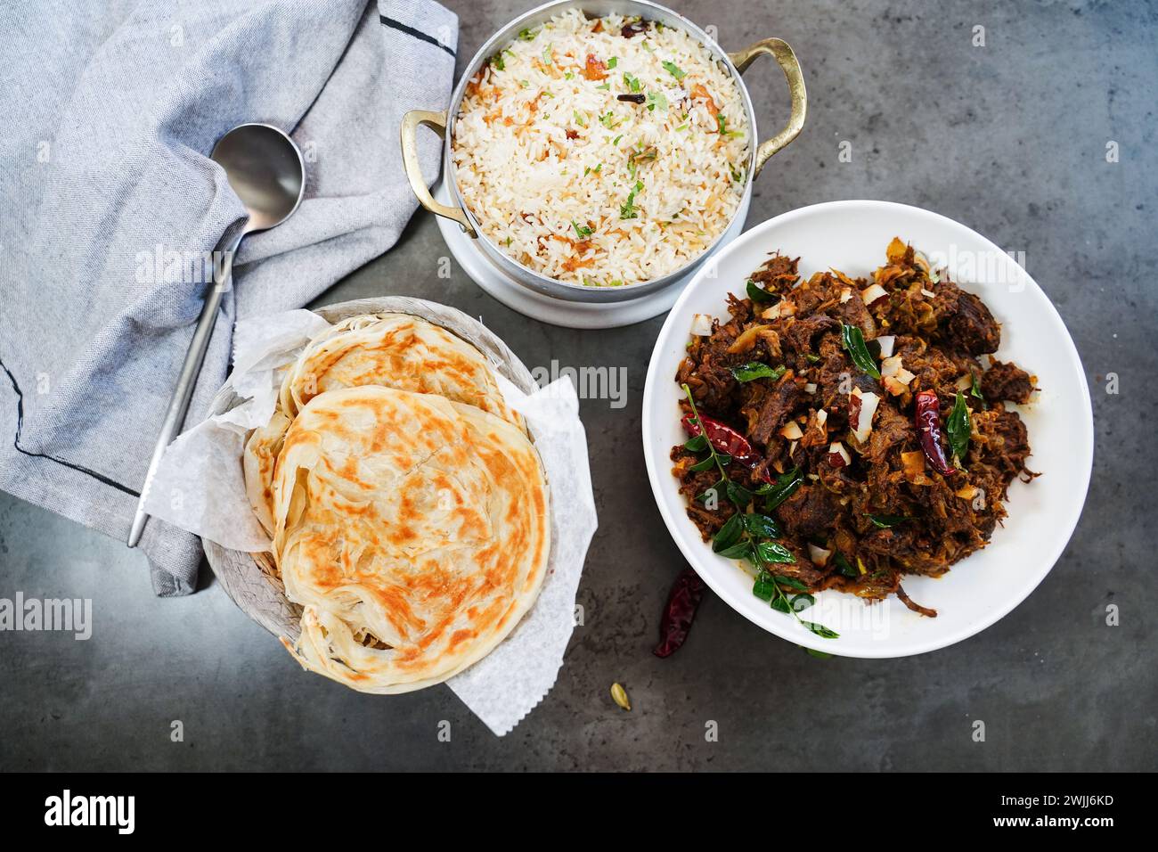 Kerala beef fry roast served with parotta and ghee rice - Malabar Iftar ...