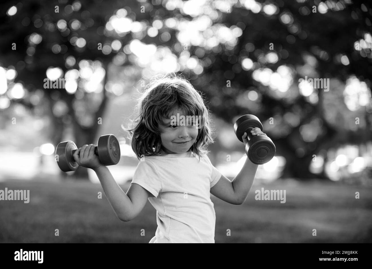 Child boy portrait muscle man hi-res stock photography and images - Alamy
