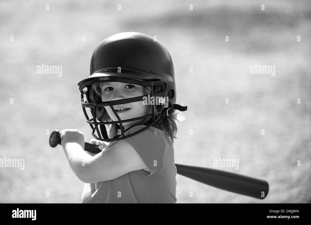 Baseball kid player in baseball helmet and baseball bat Stock Photo - Alamy