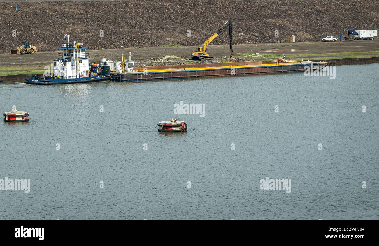 Panama Canal, Panama - July 24, 2023: Culebra tugboat and barge with ...