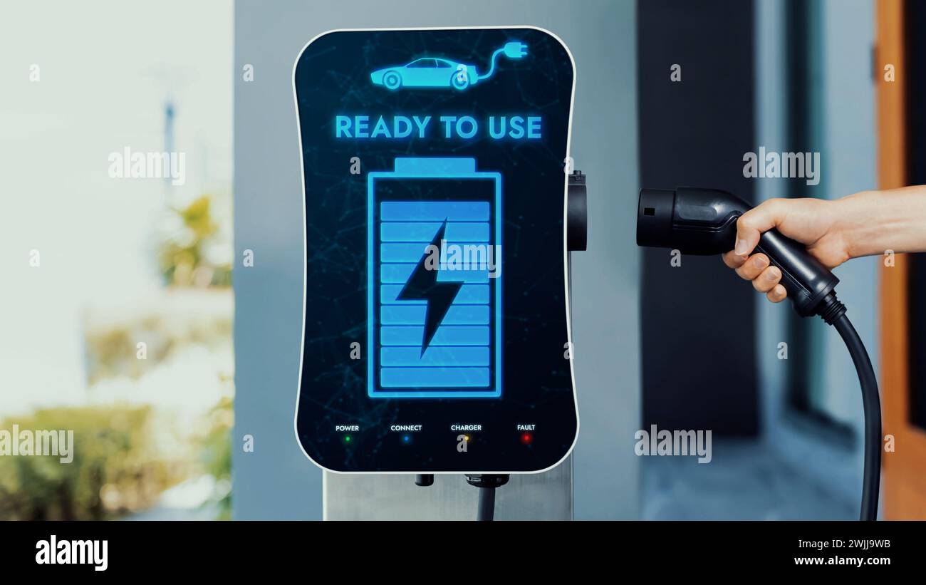 Home electric charging station showing battery status interface on ...